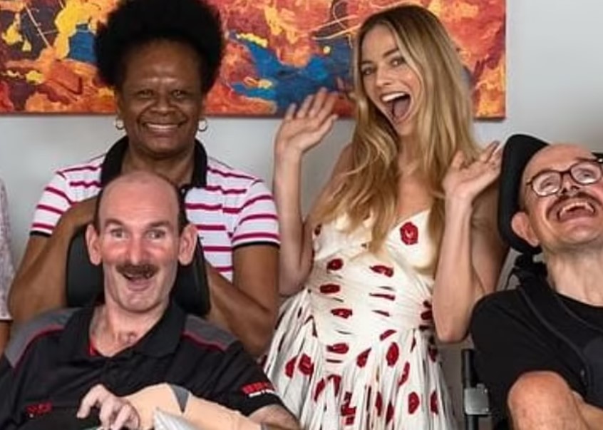 Margot Robbie visits charity supporting disabled people