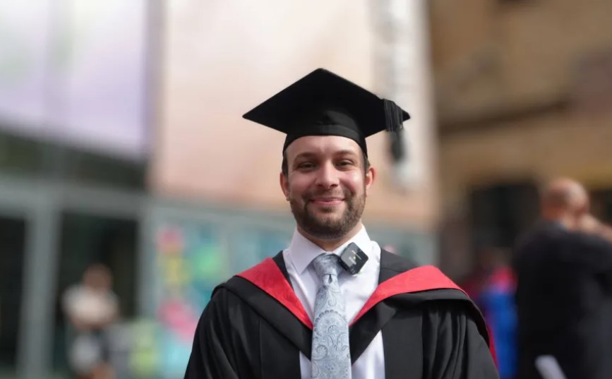 Student who devoted studies supporting disabled people graduates